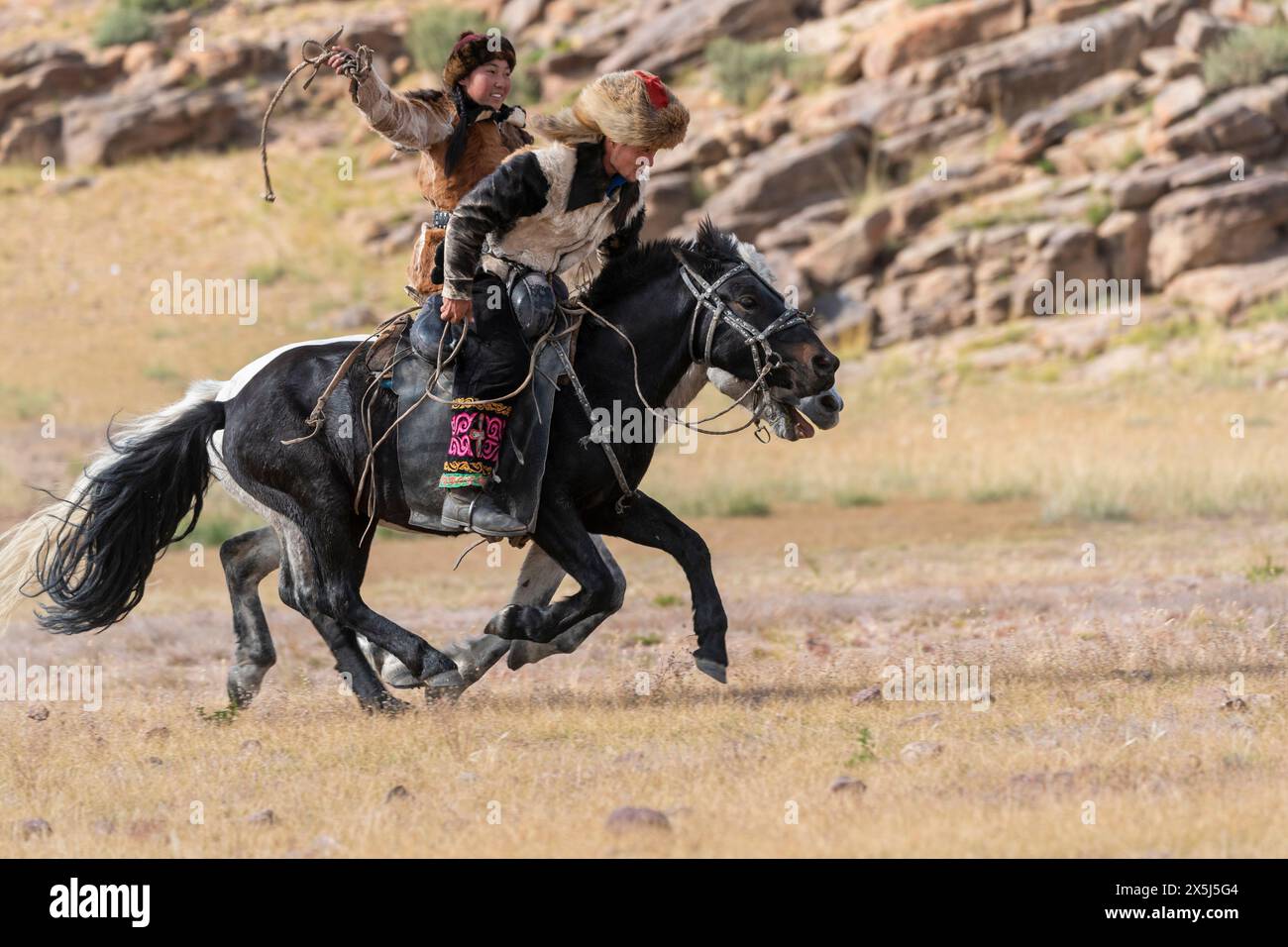 Asia, Mongolia, Bayan-Olgii Province. Altai Eagle Festival, horse games ...