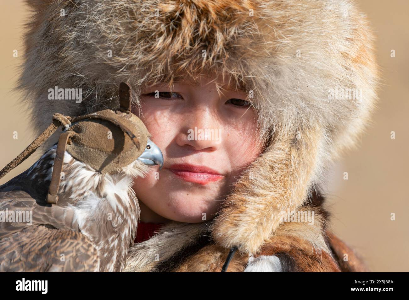 Asia, Mongolia, Bayan-Oglii Province. Altai Eagle Festival, young boy ...