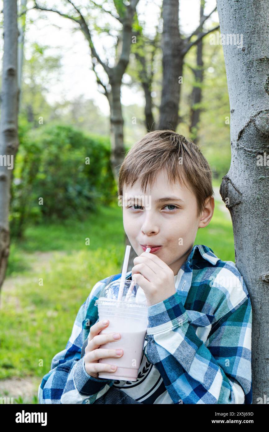 Nice boy having fun outdoor Stock Photo - Alamy
