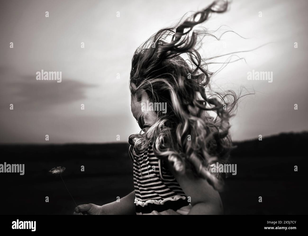 Strong wind blowing hair hi-res stock photography and images - Alamy