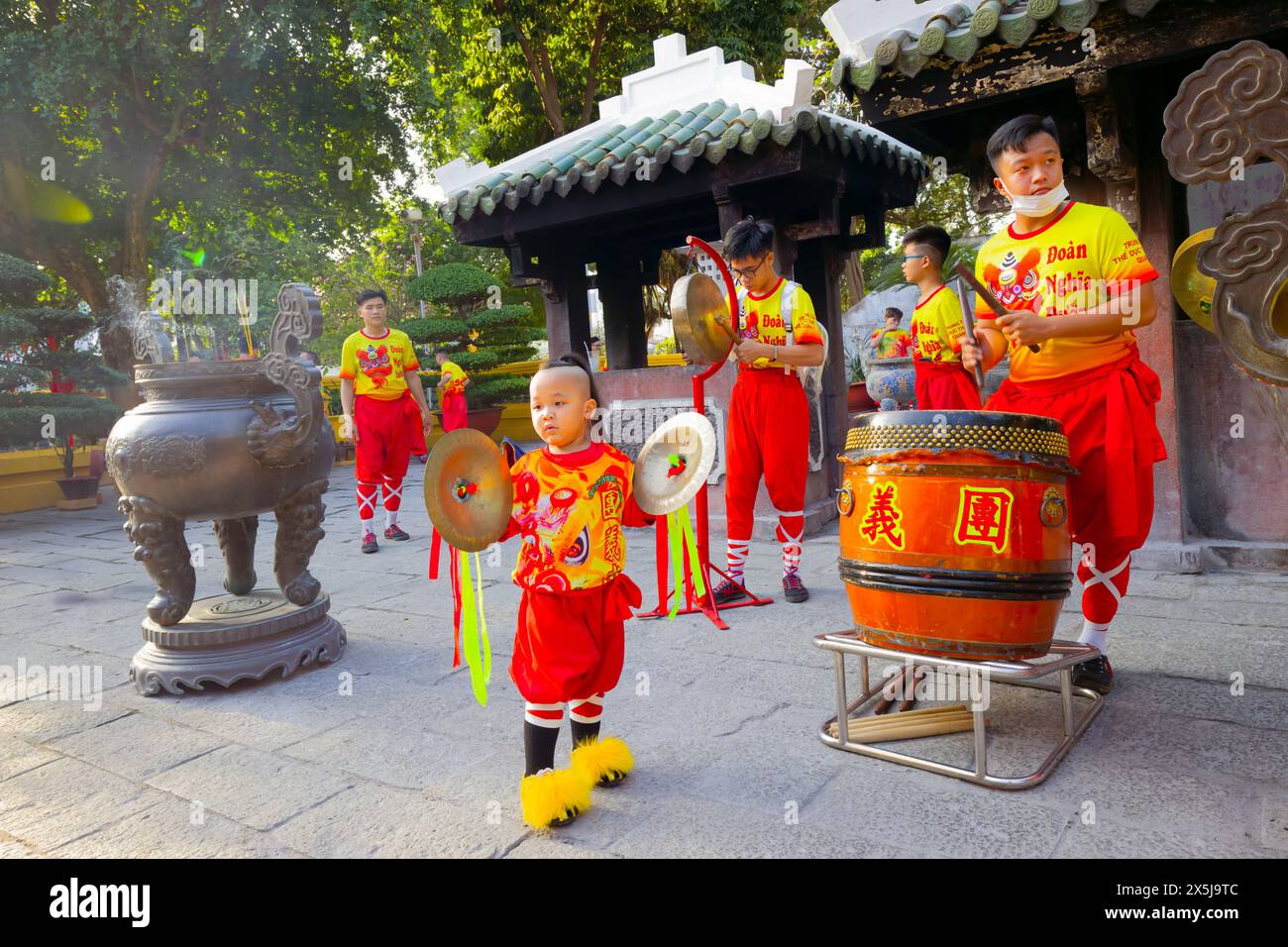Vietnam, Saigon, Ho Chi Minh City. Dragon dancers entertaining in ...