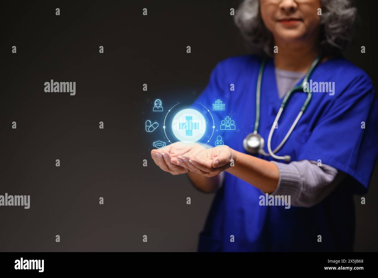 Senior doctor holding blue virtual plus sign. Health insurance and ...