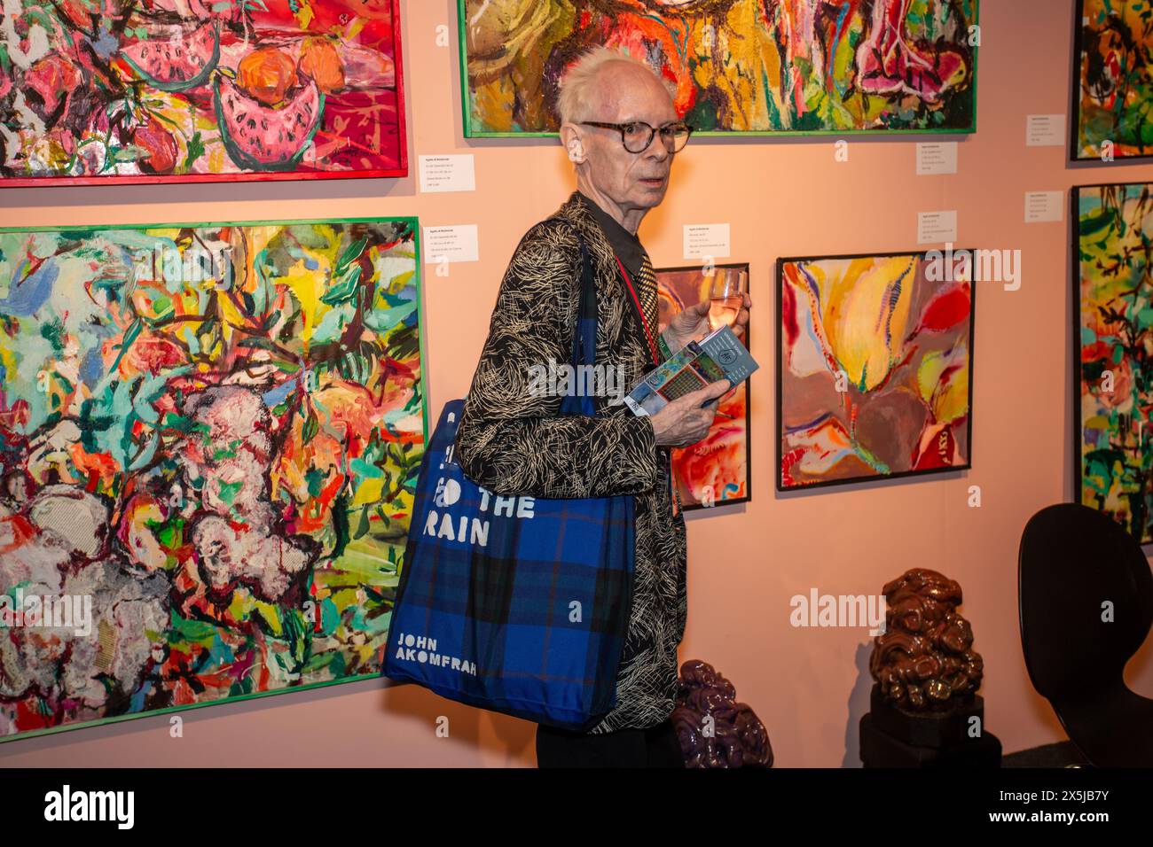 Anthony Fawcett personal assistant to John Lennon observing paintings ...