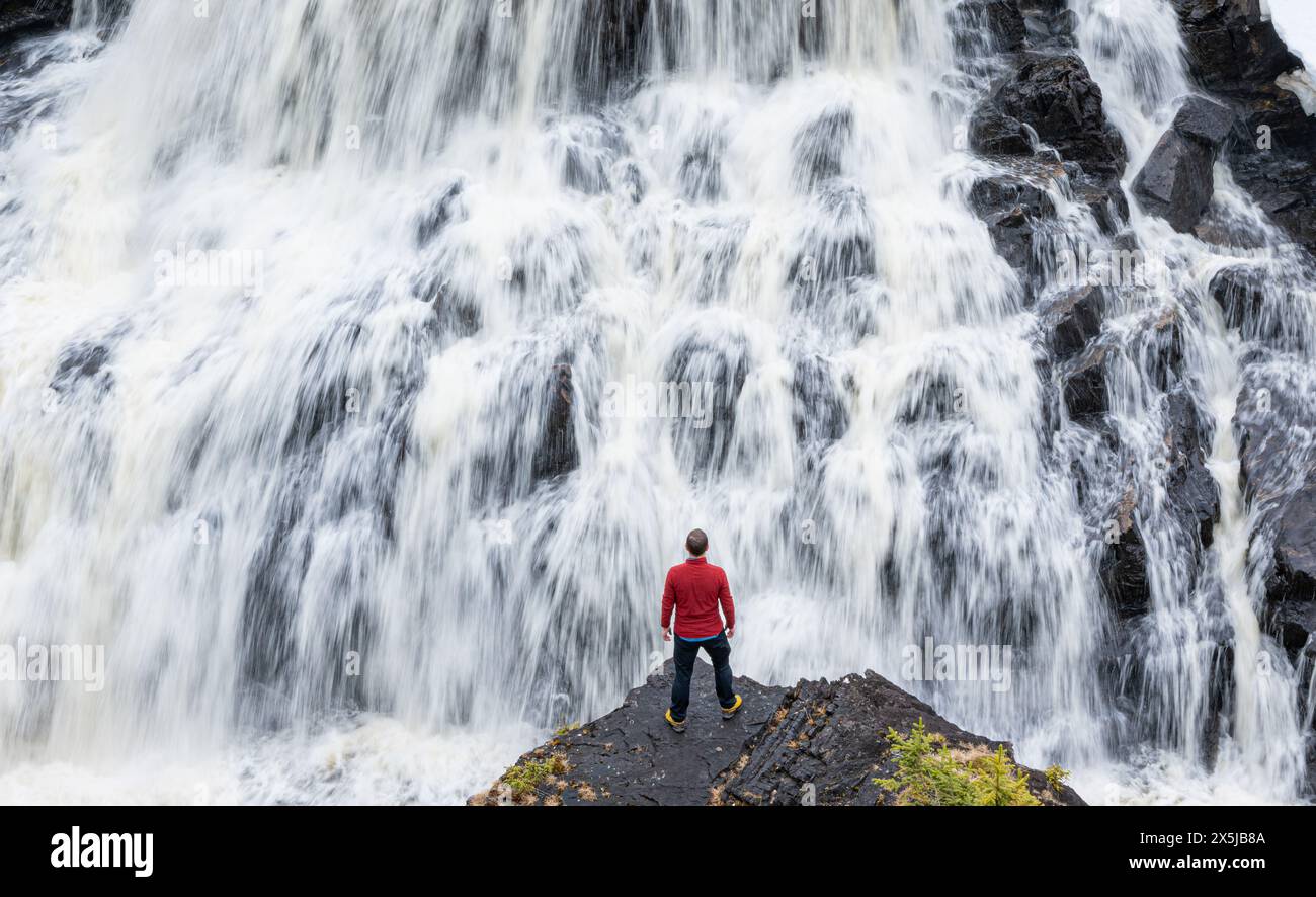 Man vs Water, Voringsfossen, Waterfall in Norway Stock Photo - Alamy