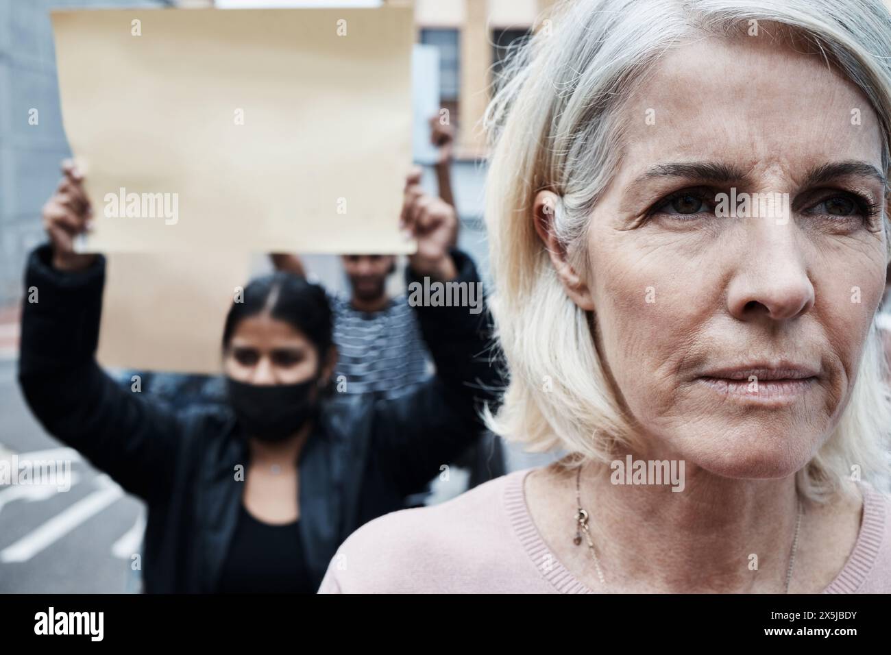 Mature woman, city and protest outdoor for vaccine, change and ...