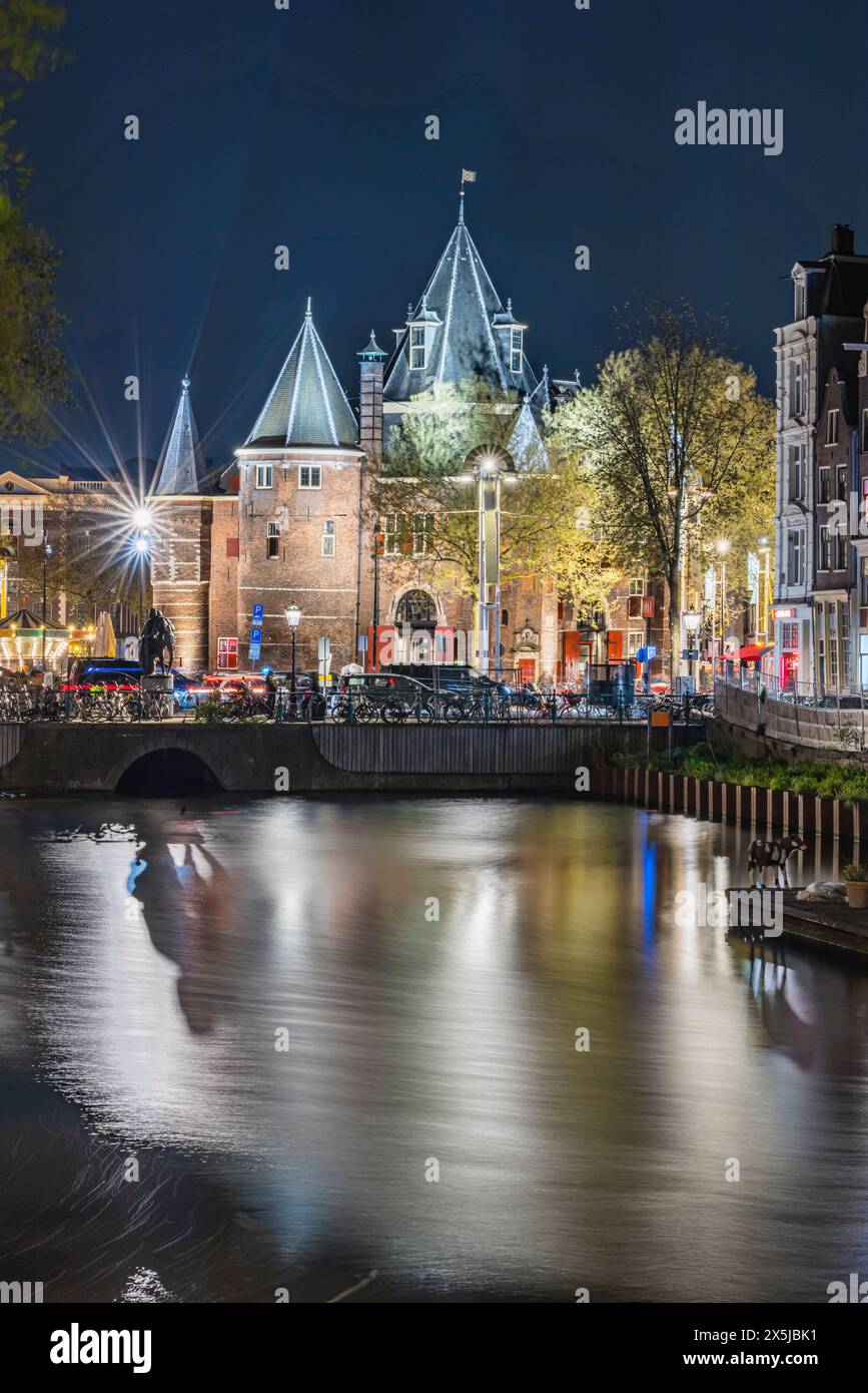 Netherlands, North Holland, Amsterdam. Lights and reflections at night ...