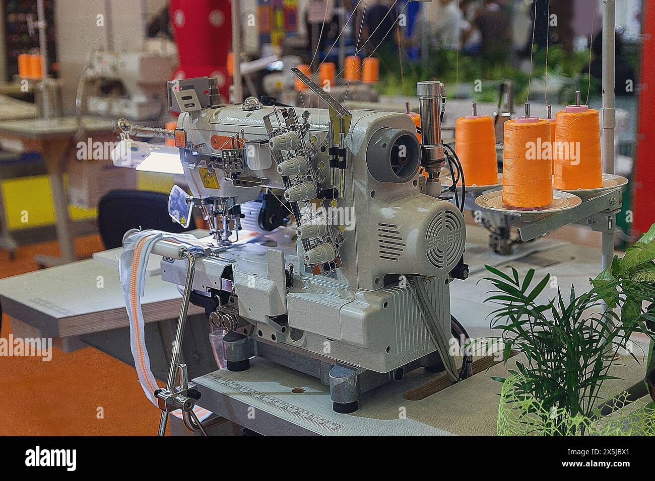 Modern computerized bartacking sewing machine at the factory. Industry ...