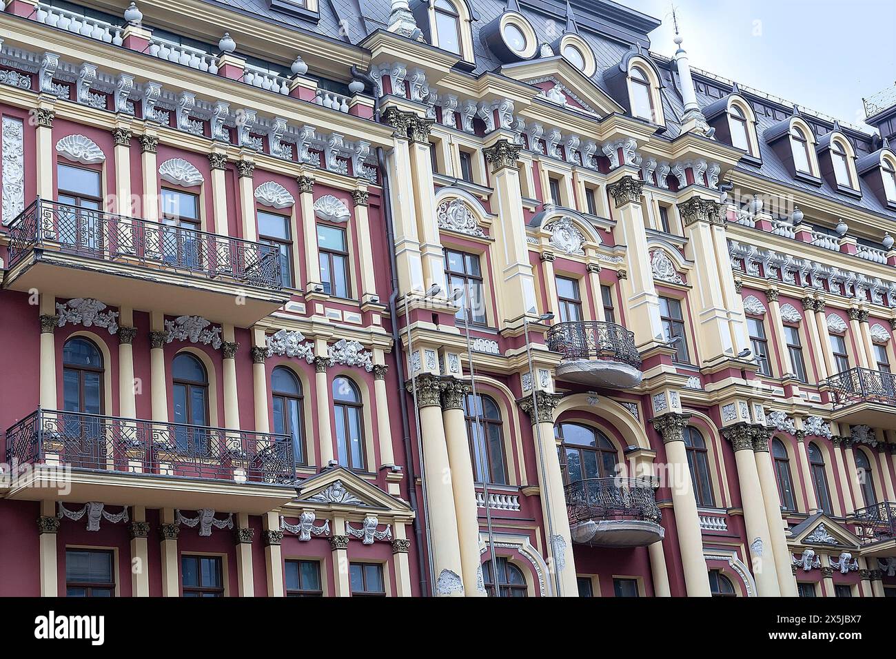 Facade of a beautiful classical style building with traces of ...