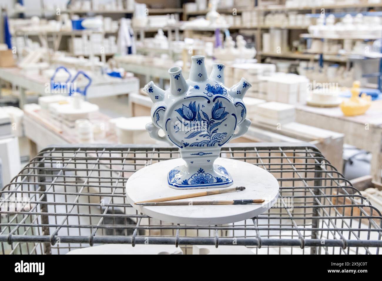 Netherlands, South Holland, Delft. A Delftware tulip vase at the Royal ...