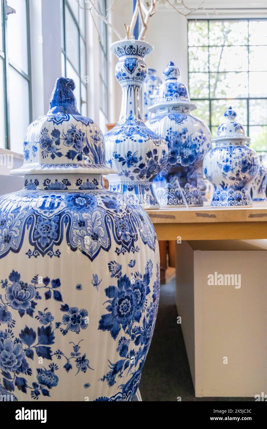 Netherlands, South Holland, Delft. Delftware pots at the Royal Delft ceramics factory ...