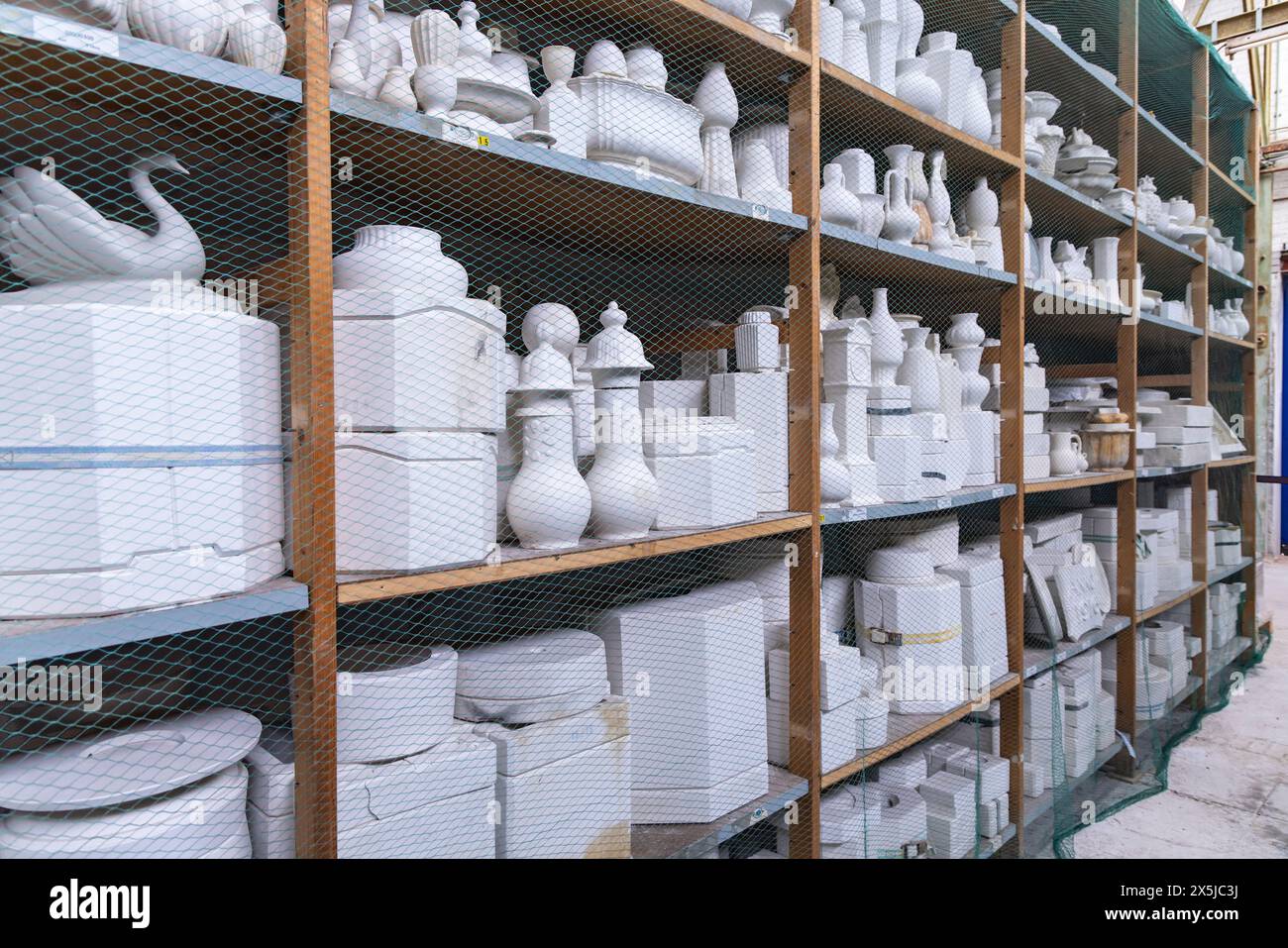 Netherlands, South Holland, Delft. Delftware porcelain pots waiting to ...