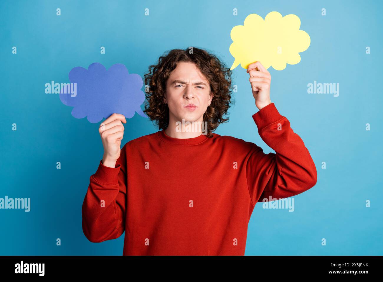 Photo of funky doubtful guy dressed red pullover rising mind clouds ...