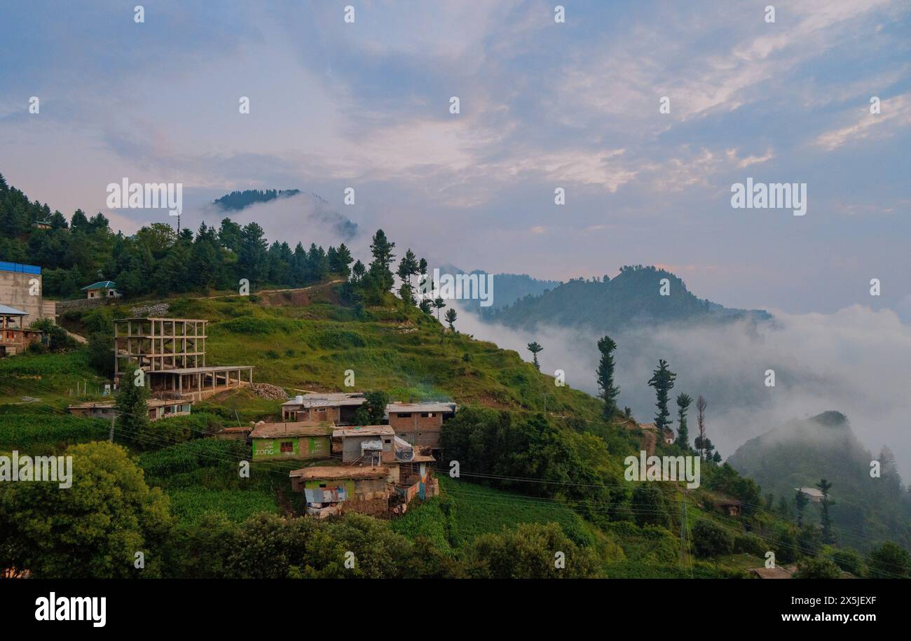 Green valley village mountain backdrop hi-res stock photography and ...