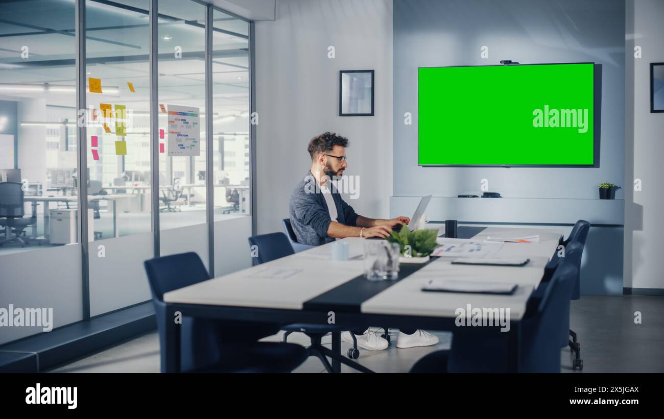 Office Conference Meeting Room: Handsome Hispanic Specialist Working on ...