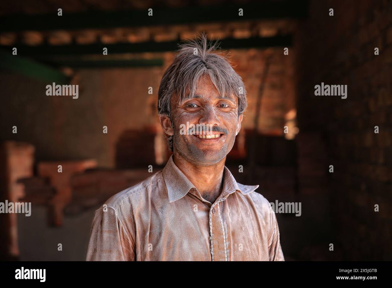 worker of salt factory Stock Photo - Alamy