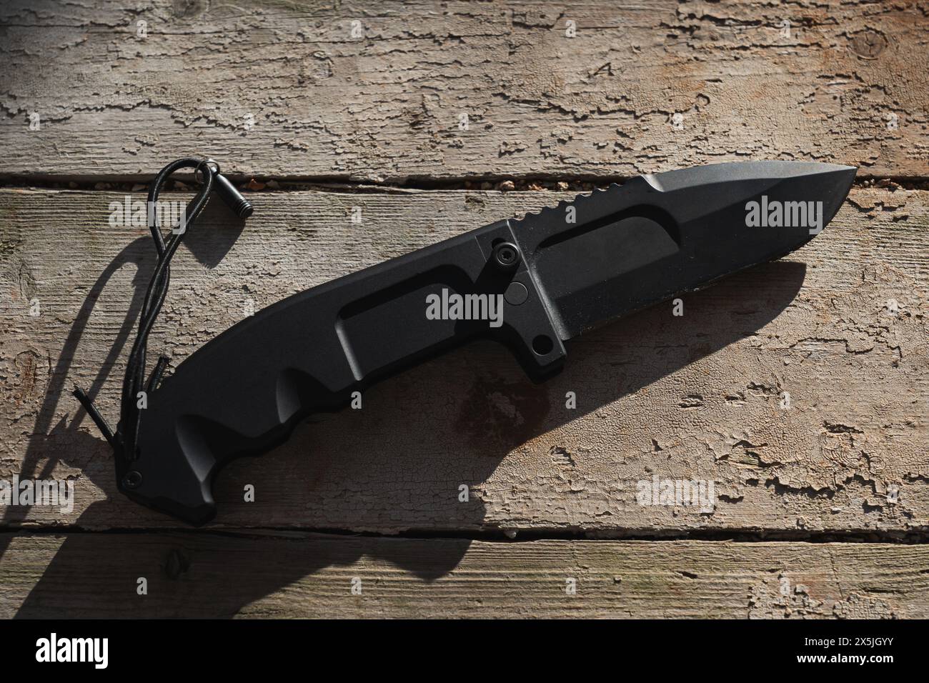 Modern tactical knife black hi-res stock photography and images - Alamy