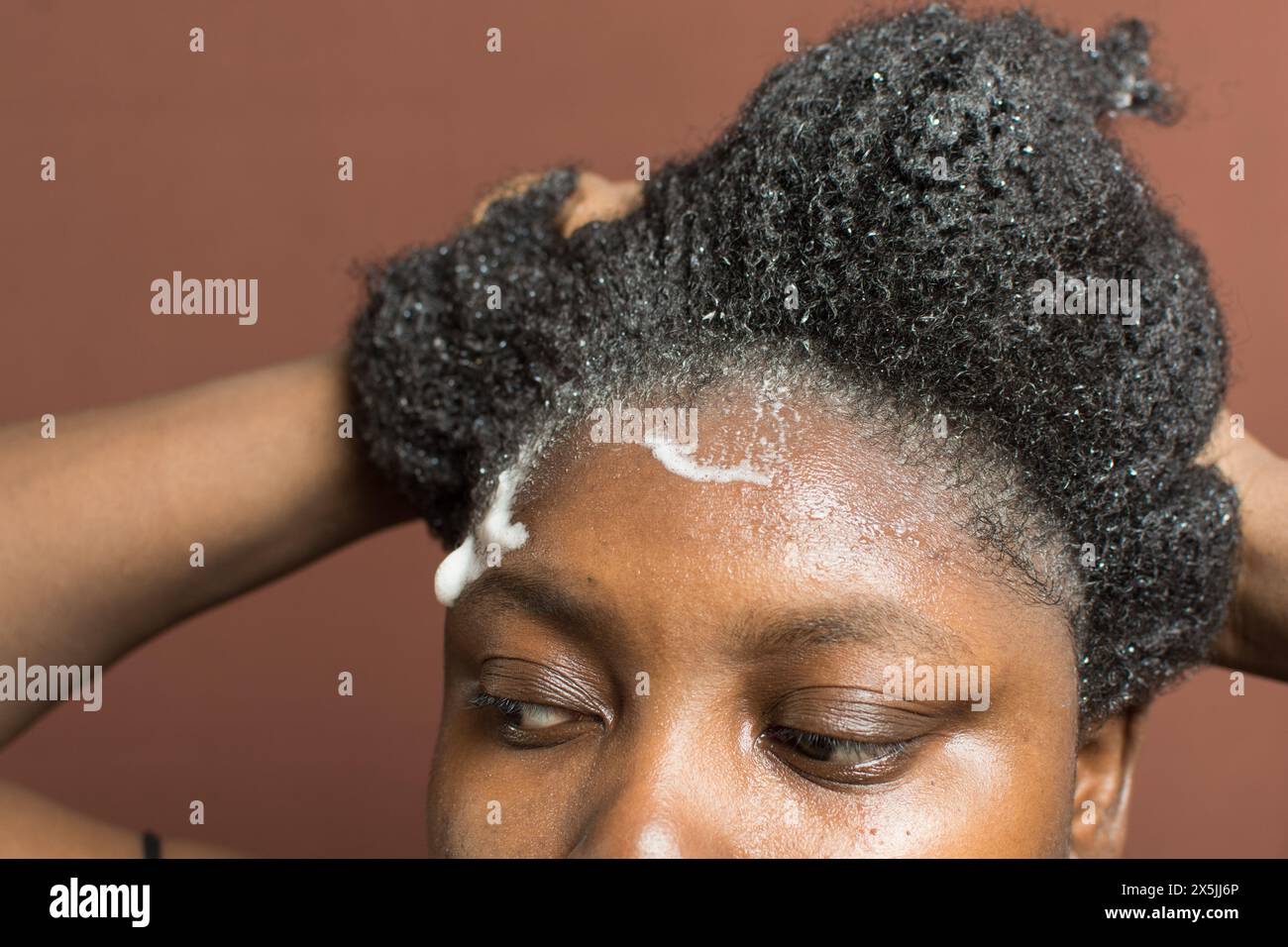 Washing curly hair with a shampoo, shampooing 4c coily hair, scrubbing ...