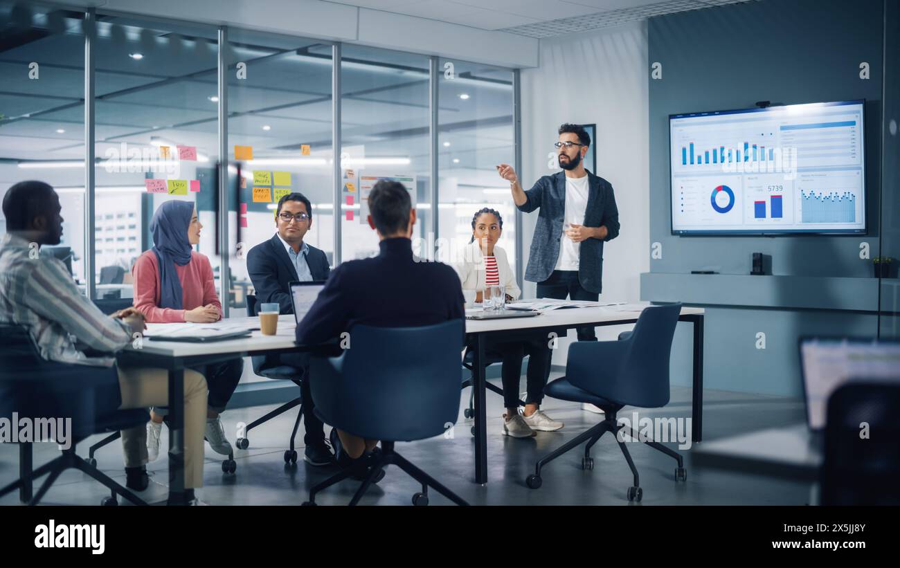 Diverse Modern Office: Businessman Leads Business Meeting with Managers ...