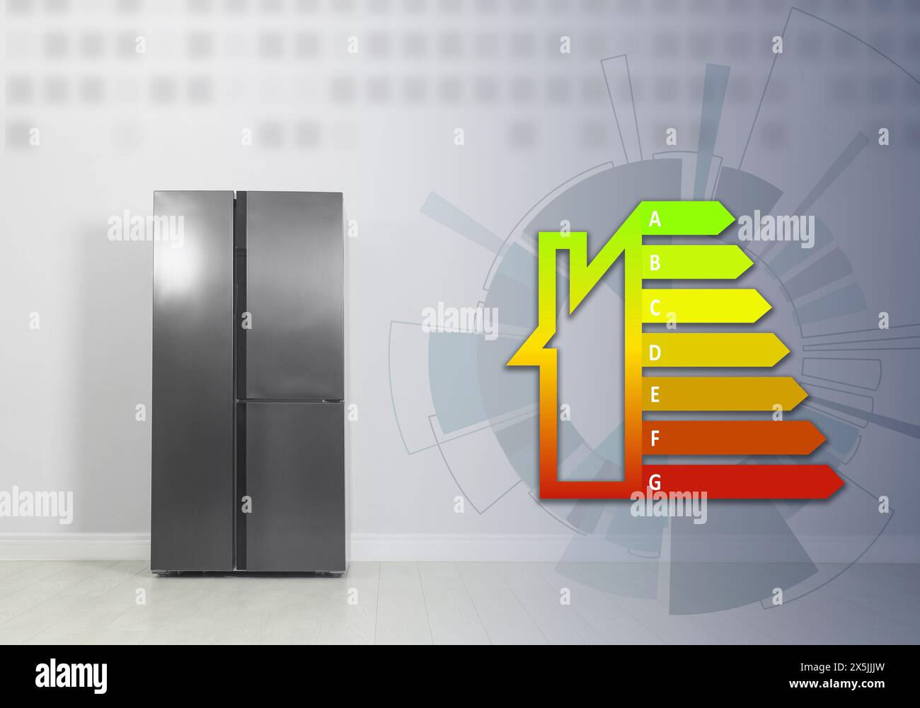 Energy efficiency rating label and refrigerator indoors Stock Photo - Alamy