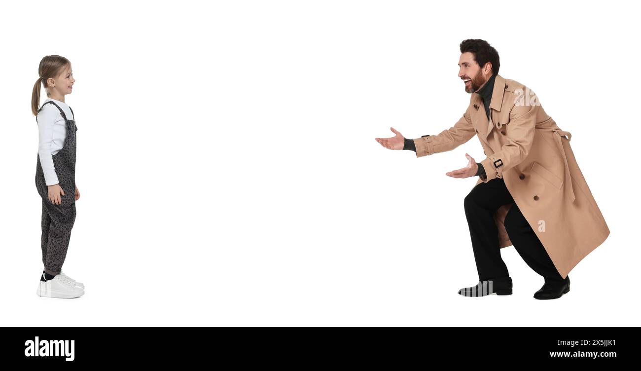 Father reaching for his daughter on white background Stock Photo - Alamy