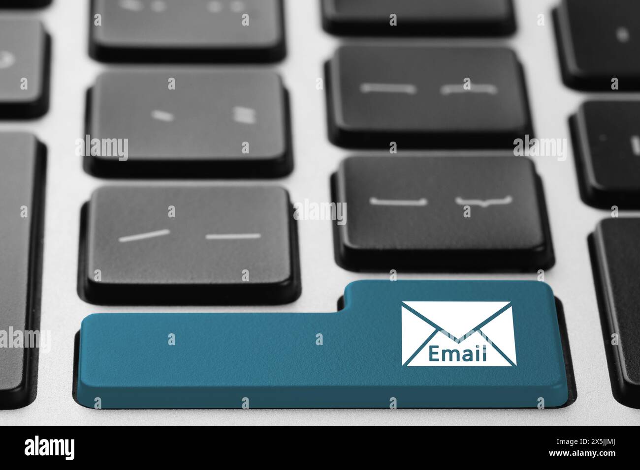 Light blue button with word Email and illustration of envelope on ...