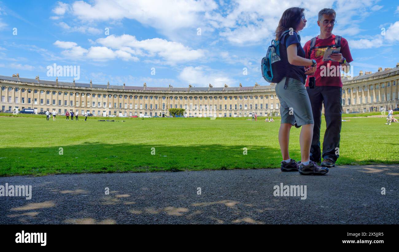 Tourists are pictured in front of Bath's iconic landmark tourist ...
