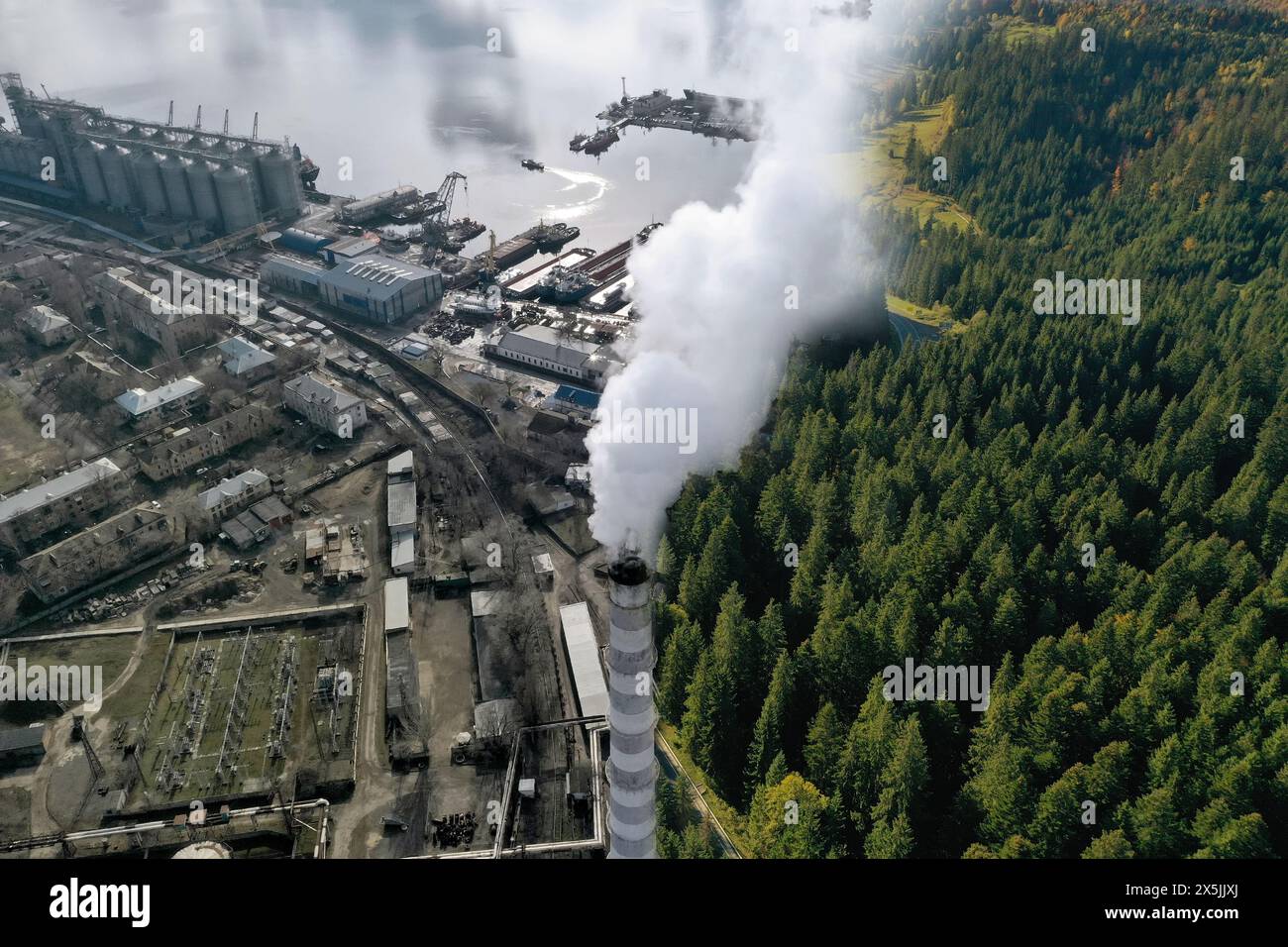 Environmental pollution. Collage divided with smoke into mountain ...