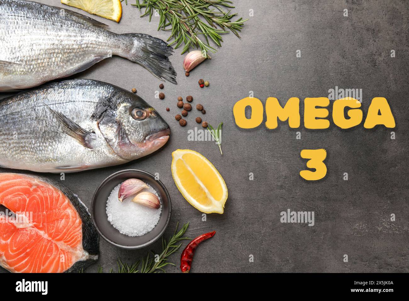 Fresh fish rich in Omega 3 oils and spices on grey table, flat lay ...