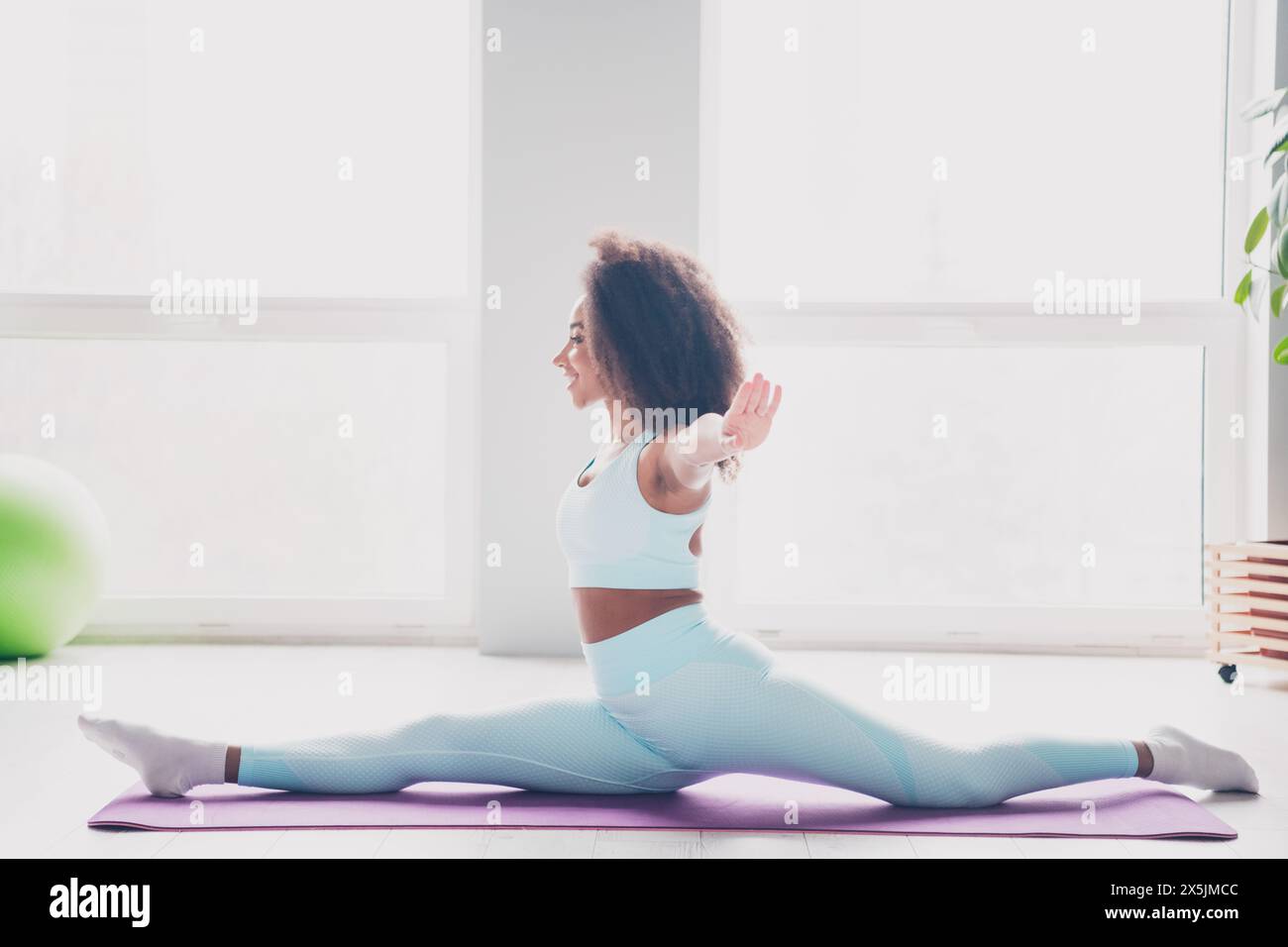 Full length photo of slender adorable woman sportswear sitting legs ...