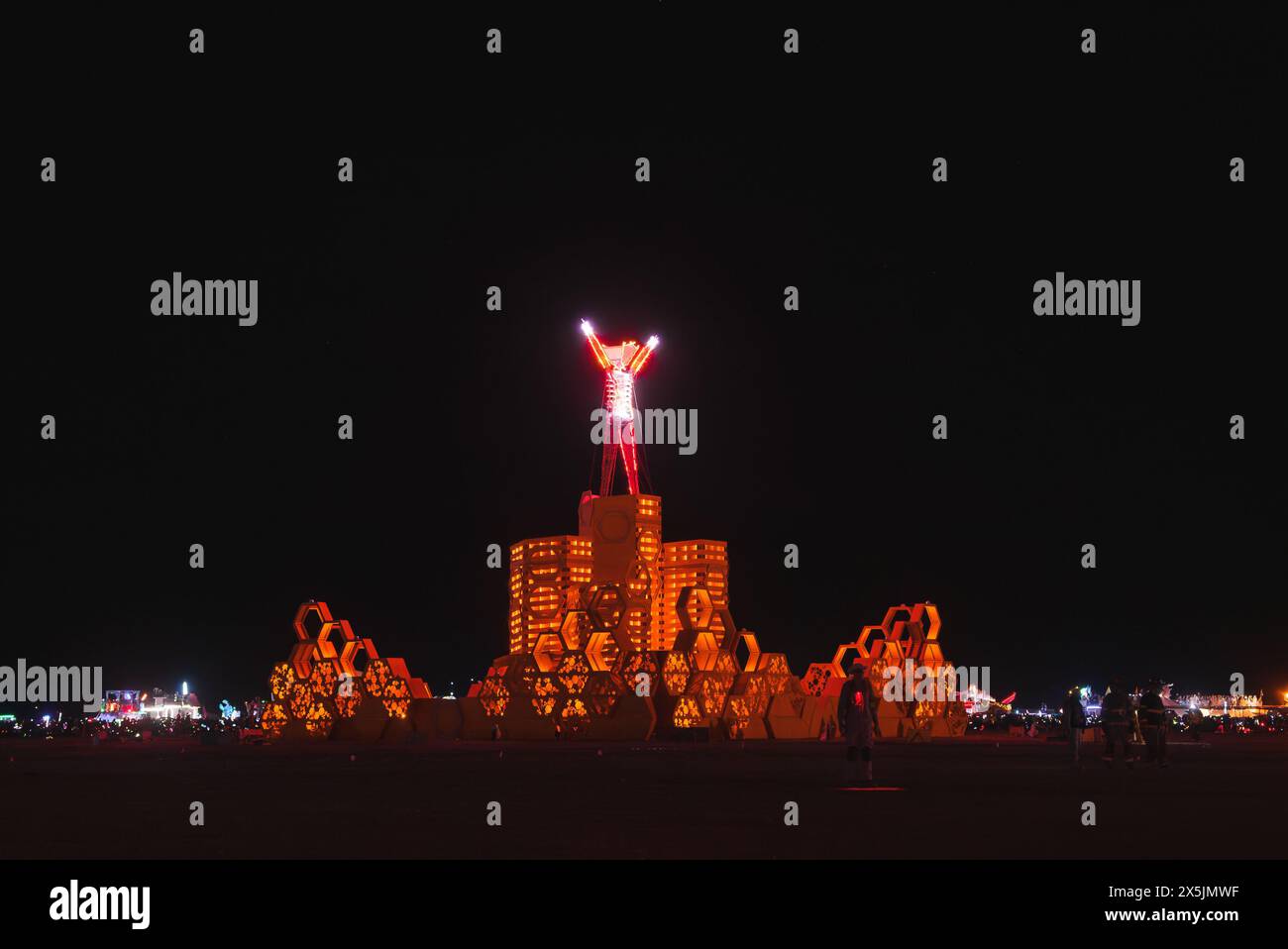 Nighttime desert festival artwork installation at human figure ...