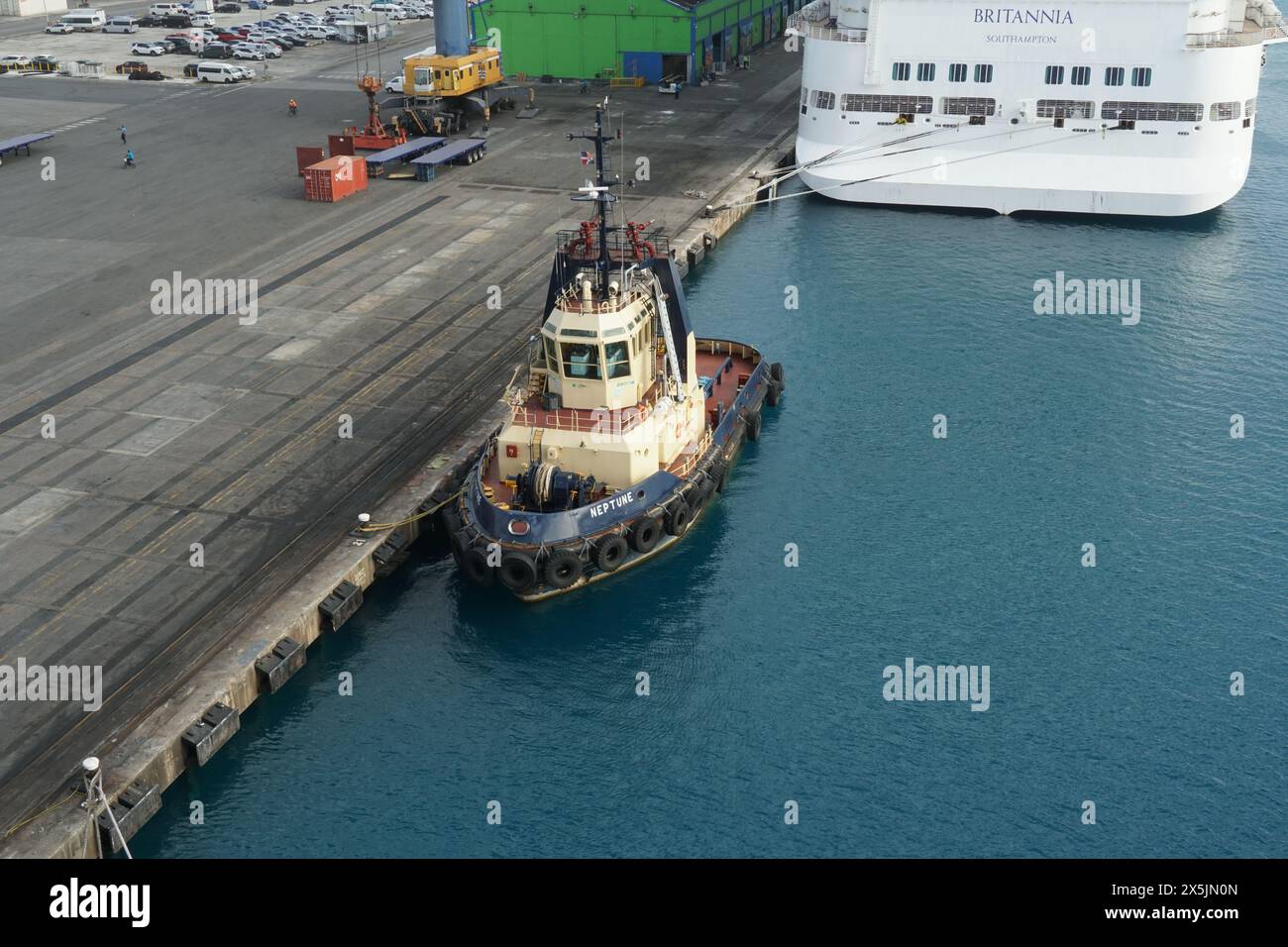 Tug boat and stern section, of the Royal-class Britannia cruise ship ...