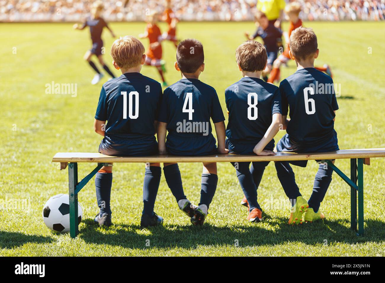 Substitute Players in Soccer Team Sitting on the Bench. Multiethnic ...