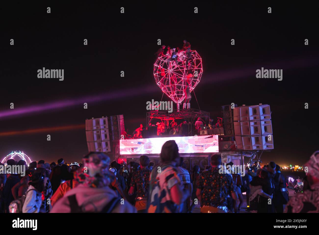 Vibrant Nighttime Music and Art Festival in Desert Stock Photo - Alamy