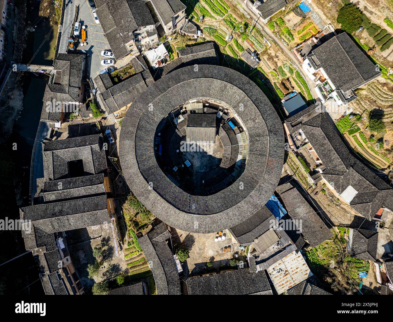 Aerial of Taxia village and Fujian Tulou, rural dwelling of the Hakka ...