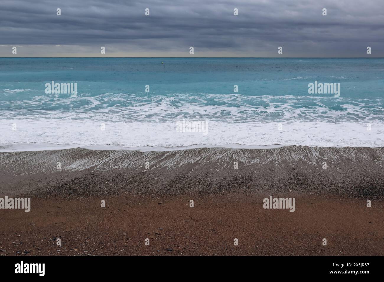 Beaches of Nice immediately after the storm, covered with sand Stock ...