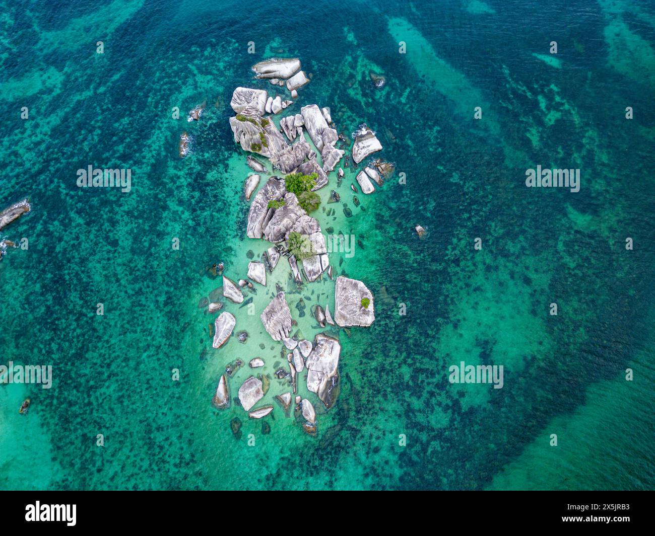 Aerial of the Batu Garuda granite rock formation, Belitung island off ...