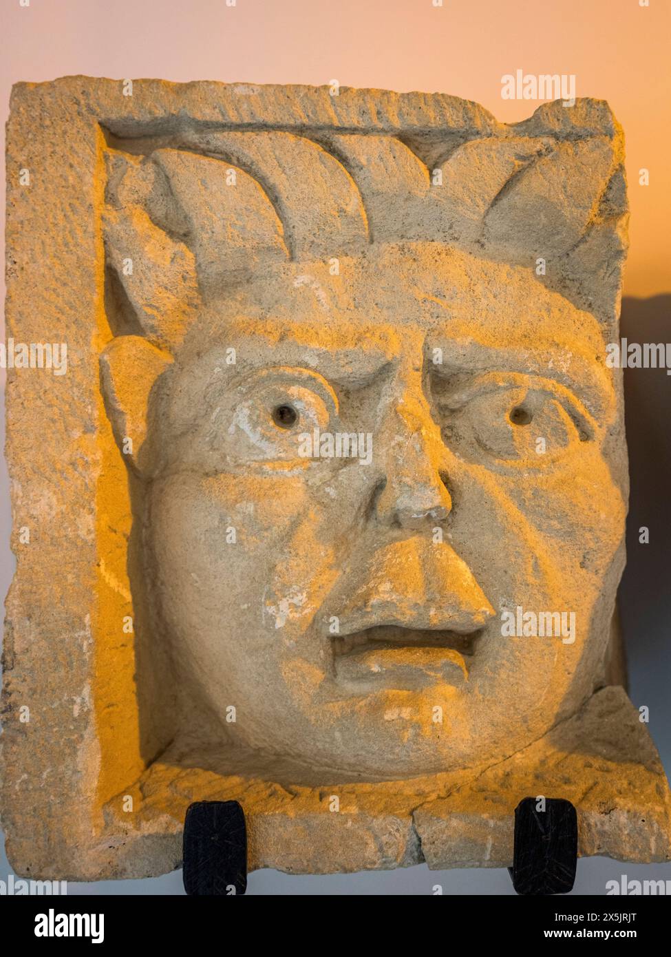 human head on a Roman funerary monument, Archeological Museum. Úbeda ...