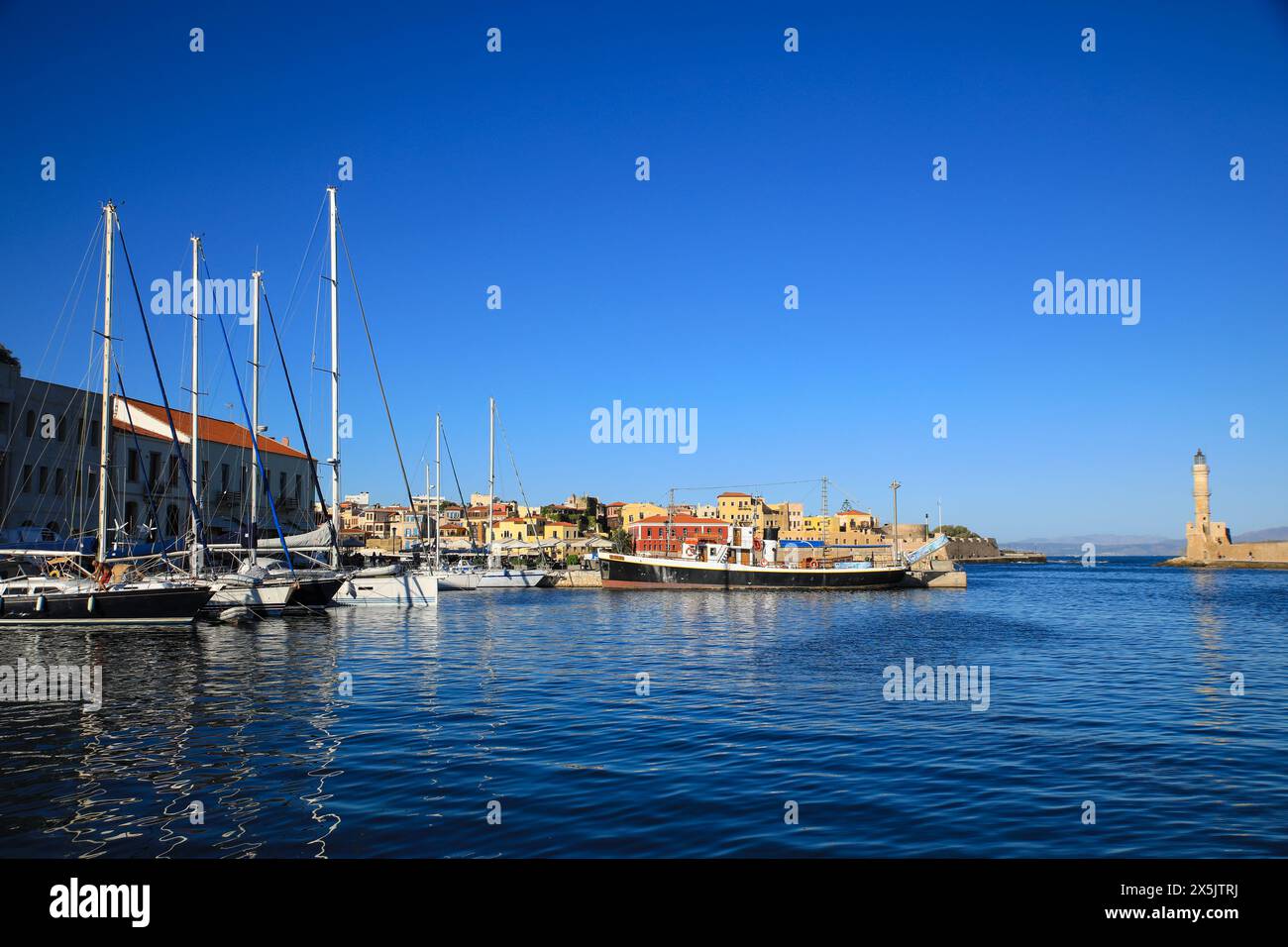 Chania, Crete, Greece. Boat harbor, Souda Bay and Chania Lighthouse ...