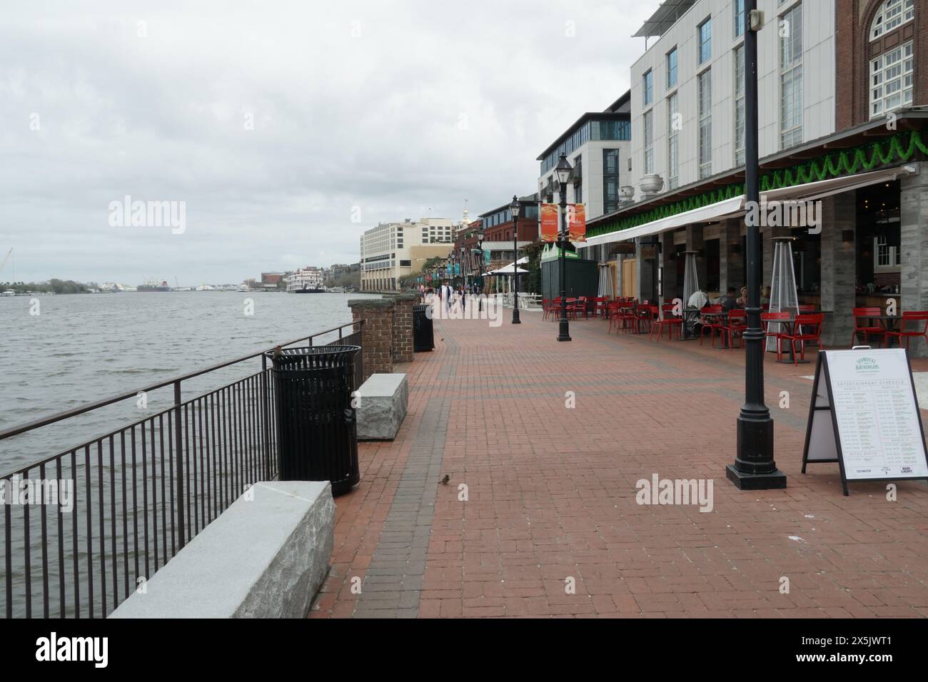 River street in Waterfront of Savannah with walking tourists and plenty ...
