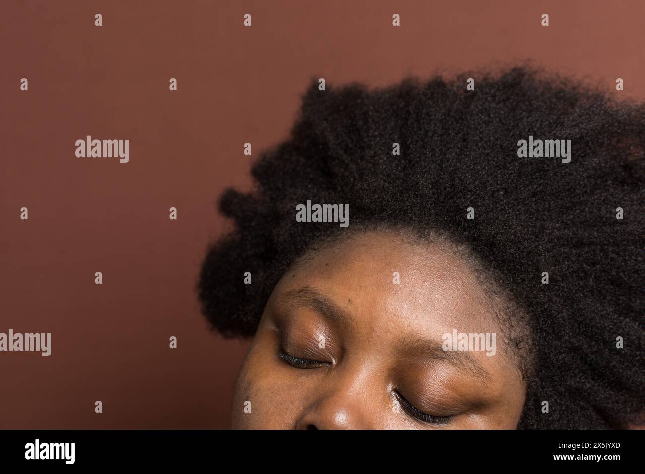 Black afro curly hair with shrinkage, Type 4c hair that is dry with a ...