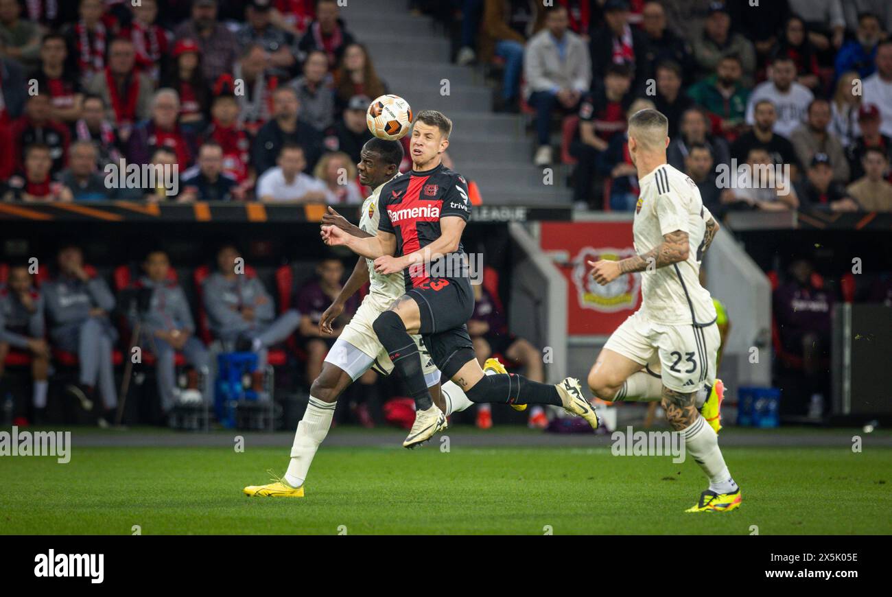 Leverkusen, Germany. 9th Mai 2024. Adam Hlozek (Leverkusen) Evan Ndicka ...