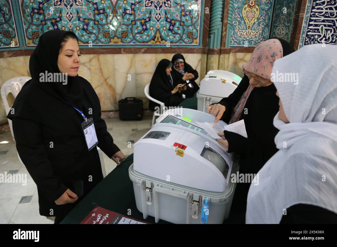 Tehran, Iran. 10th May, 2024. Iranian women vote during the ...