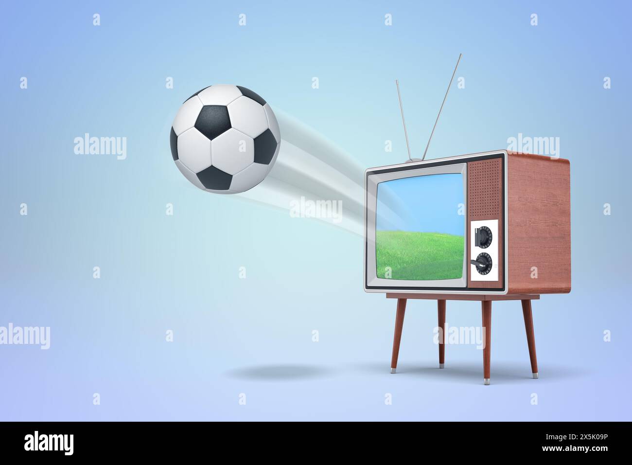 Retro TV set with a soccer ball exiting screen Stock Photo - Alamy