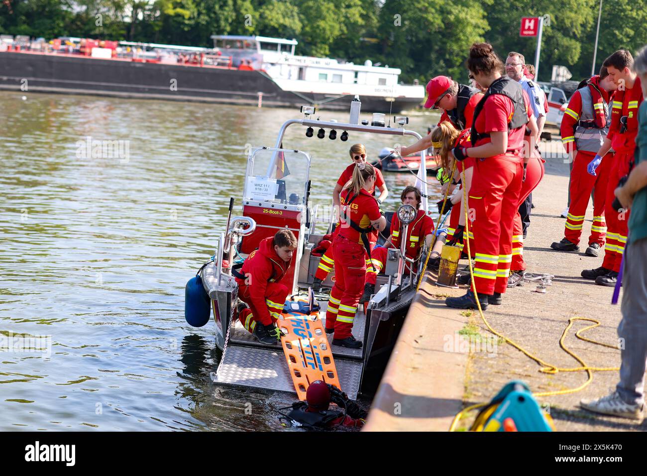 Minden, Germany. 10th May, 2024. DLRG employees practise rescuing ...