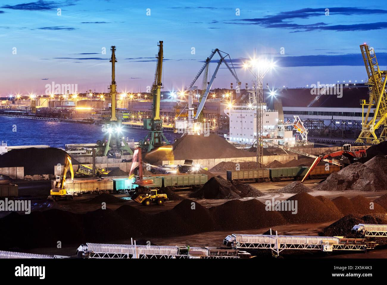 Dry bulk cargo terminal, handling coal at night Stock Photo - Alamy