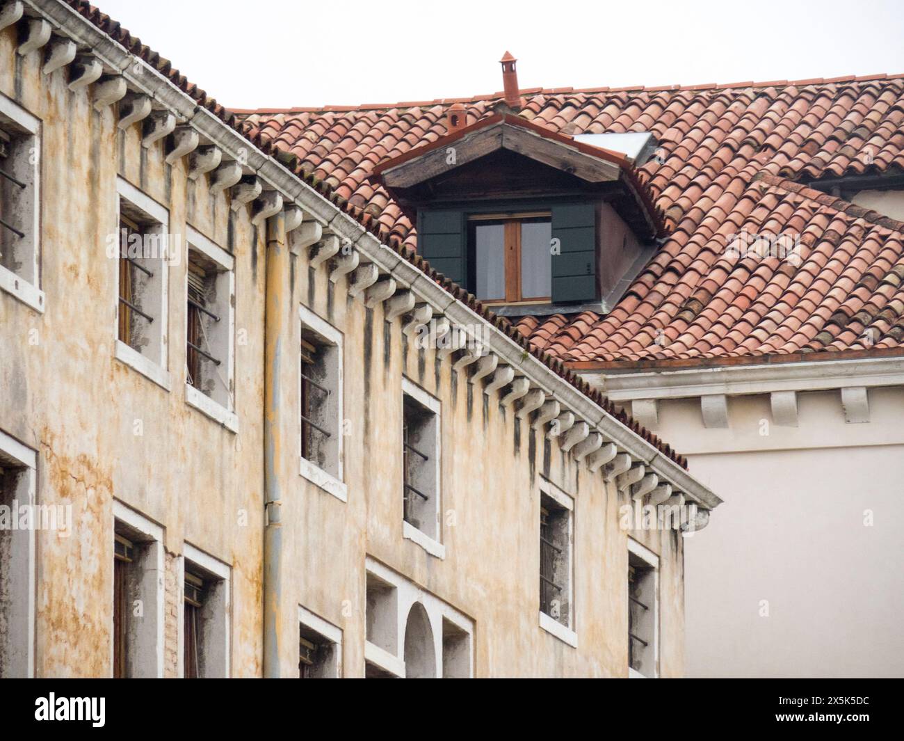 Italy, Venice. Windows and rooftops along the streets of Venice Stock ...