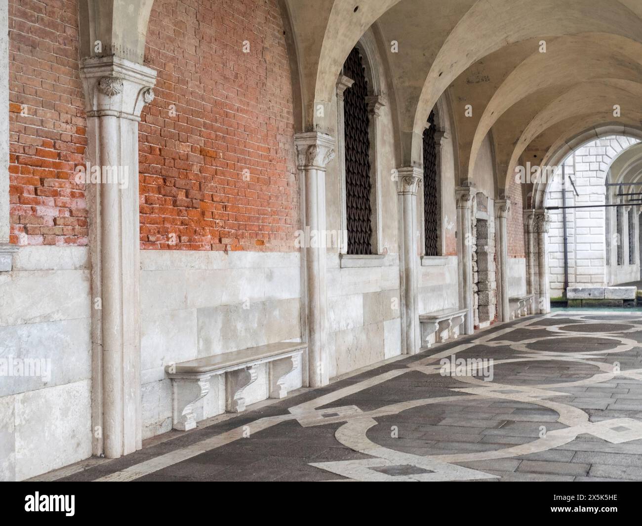 Italy, Venice. Corridor along the Doges Palace with ivory illars and ...