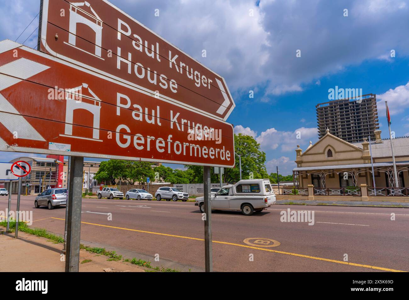View of road sign and Ditsong Kruger Museum, Paul Kruger s former home ...