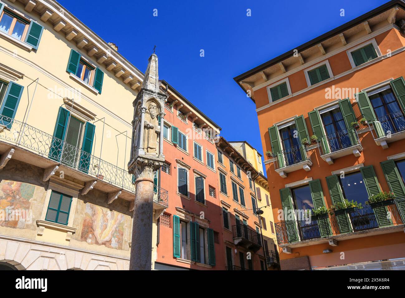 Verona, Italy. Colorful painted buildings in old town with shutters and ...