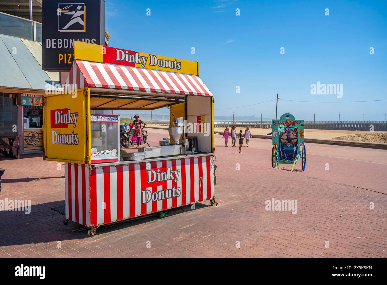 View of Dinky Donuts stall on promenade and hotels, Durban, KwaZulu ...